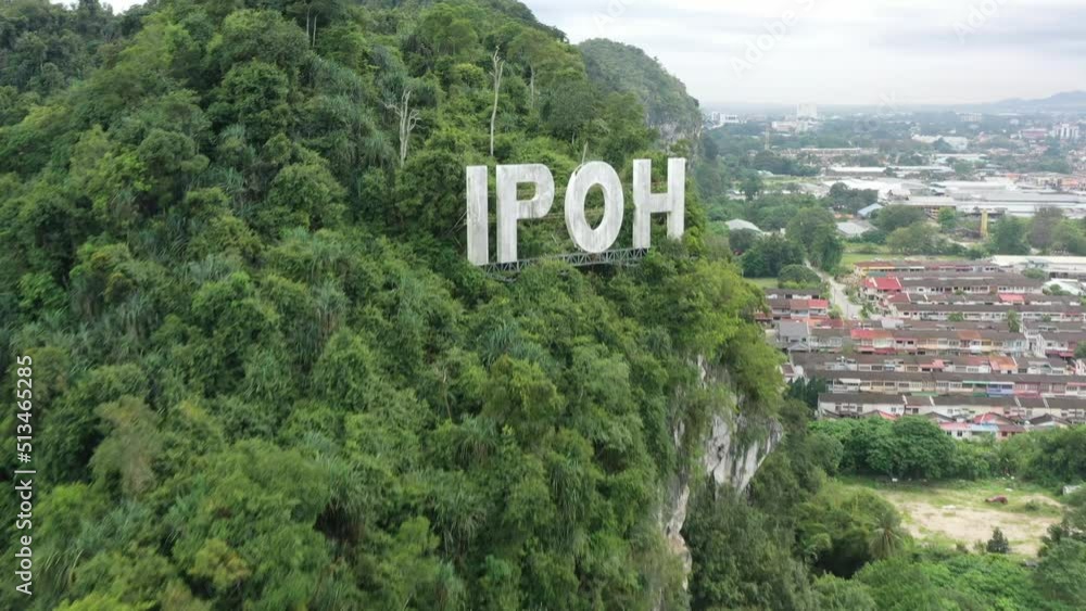 Cinematic landscape drone flyover the limestone hill with capital city ...