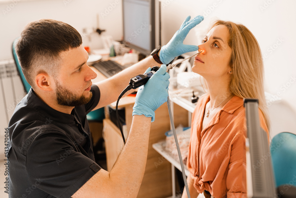 Nose endoscopy. Rhinoscopy procedure with rhinoscope. ENT doctor ...