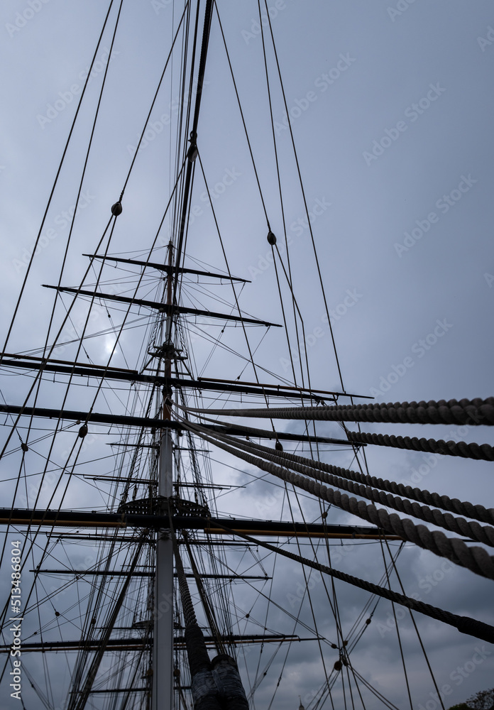 Sailing ship masts and rigging on blue sky background Stock Photo ...