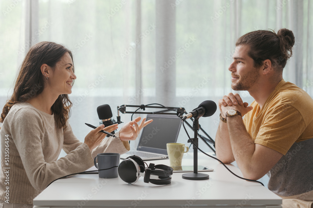 Young speaker conducting a podcast interview Stock Photo | Adobe Stock