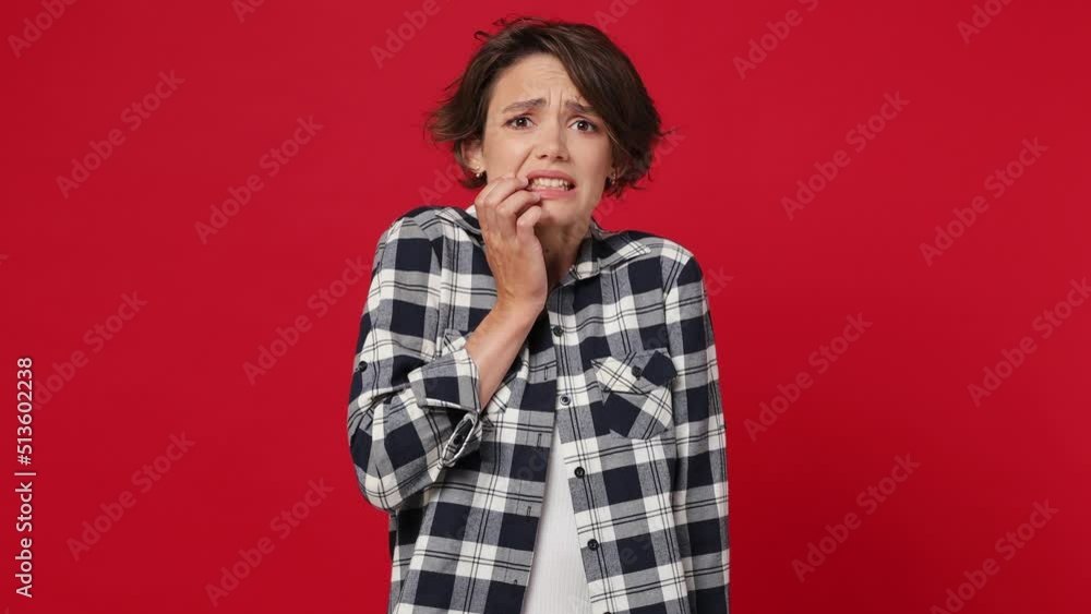 Scared sad shocked young brunette woman 20s she wearing basic white t ...