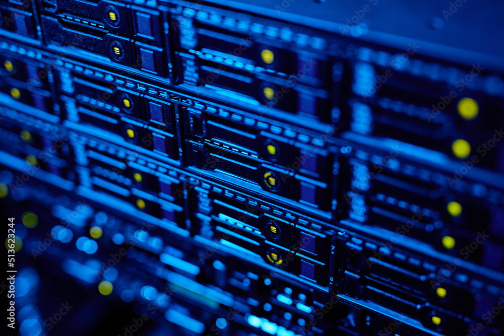 Closeup background image of blade servers with blinking neon light ...