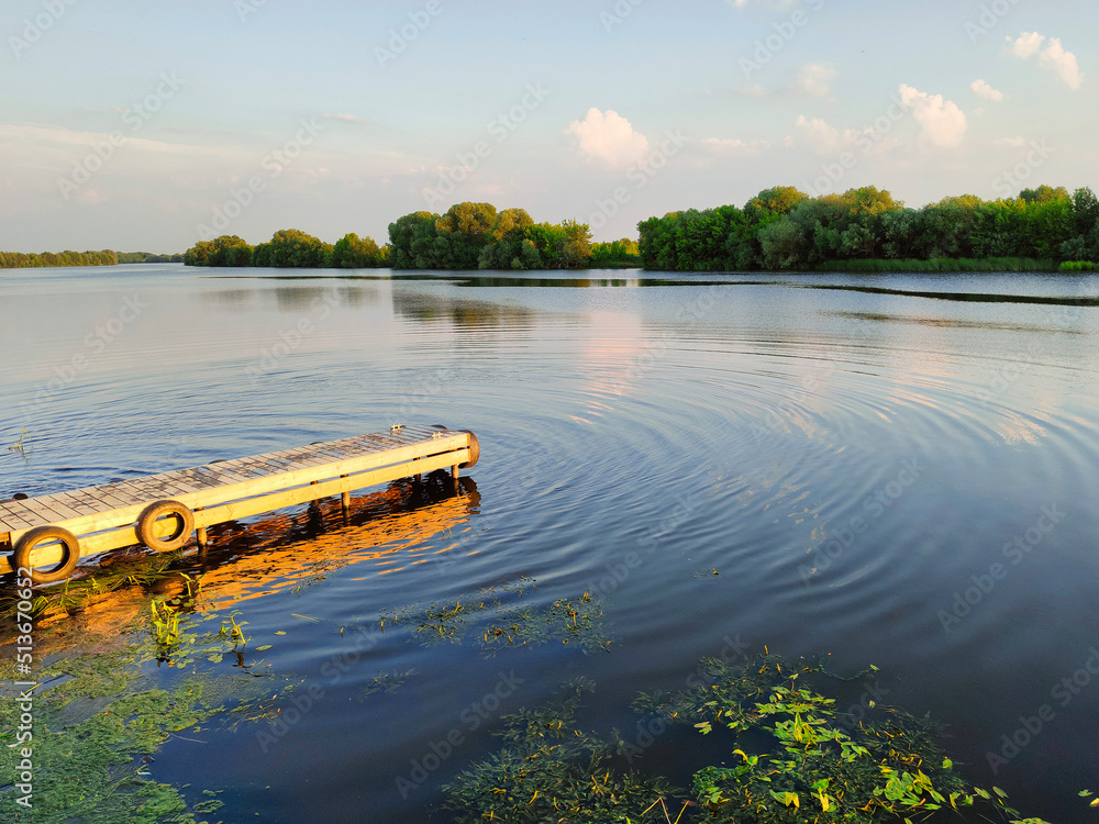 River bollard. Berth. River buildings. Coast. Stock Photo | Adobe Stock