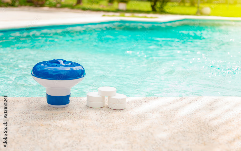 Pool float and chlorine tablets, Close up of a float and chlorine ...