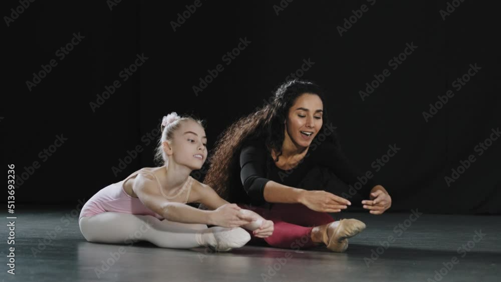 Video Stock Adult woman coach dancer teacher with child teen girl ...