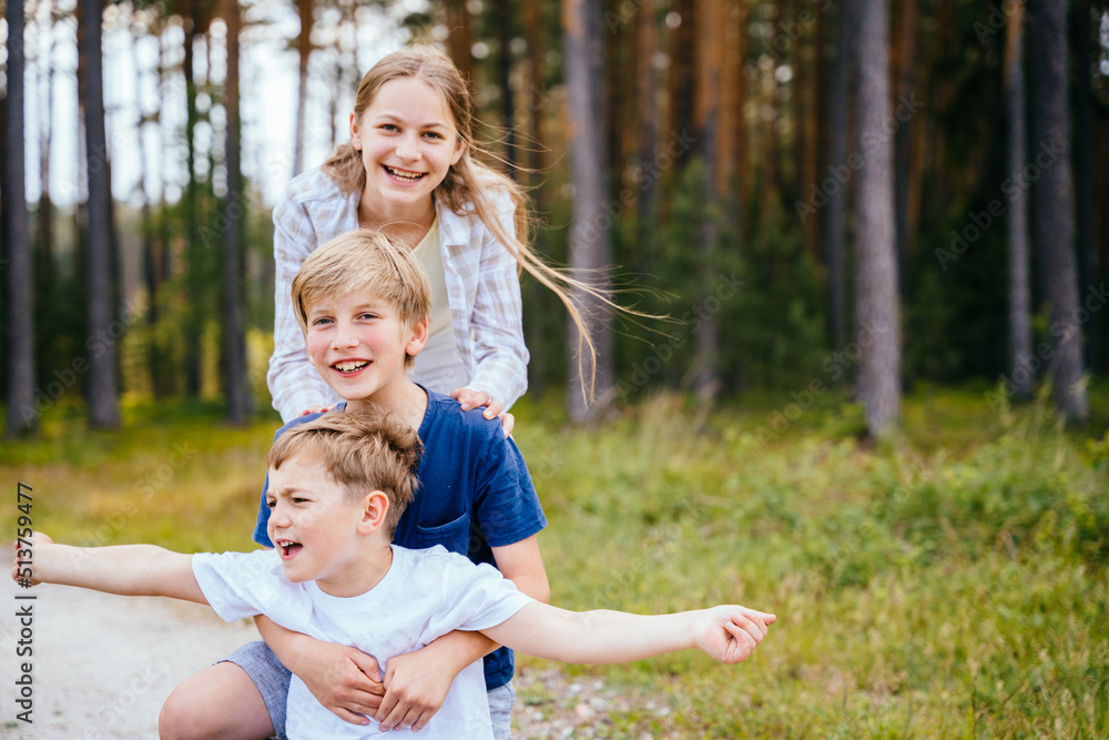 Teaching child to love nature, summer camping concept. Group of happy ...