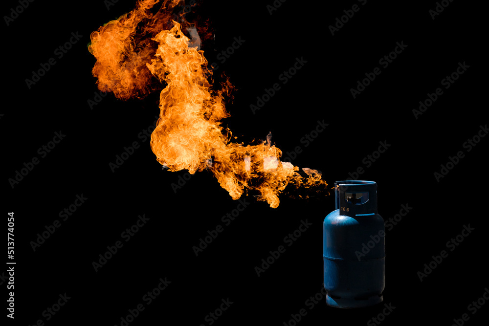 The explosion of household gas cylinders isolated on black background ...