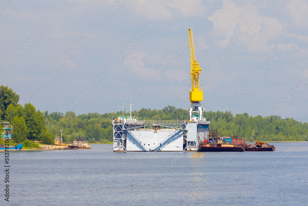 Floating dock on Yenisey river. Ship repair facility of the technical ...