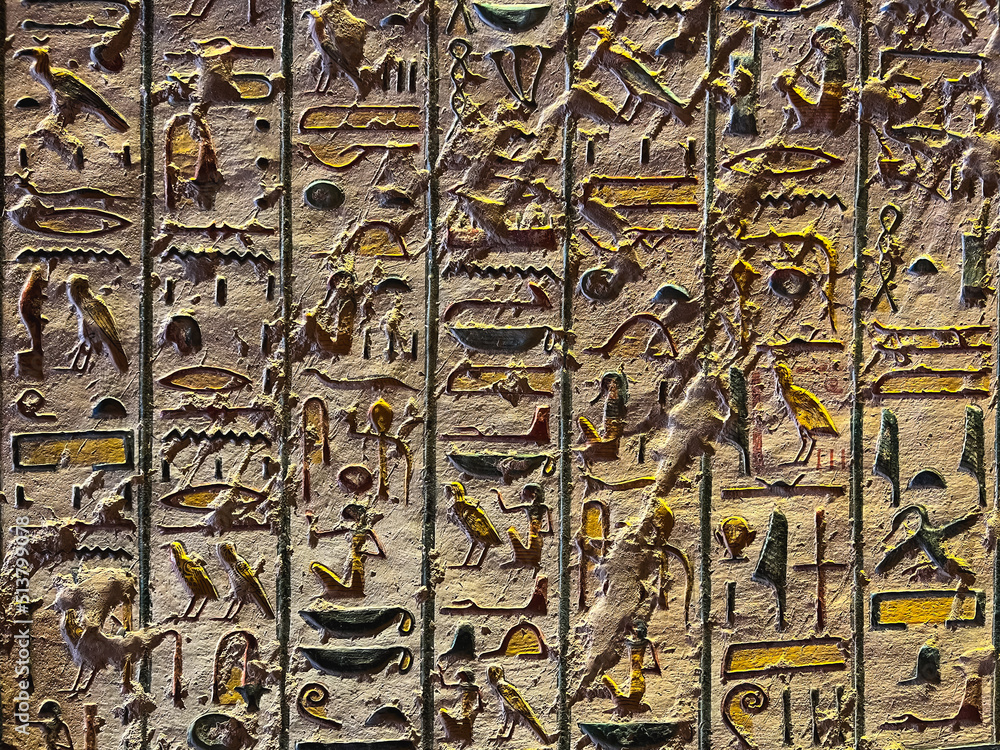 A small stone with hand carved Ancient Egyptian hieroglyphics. This ...