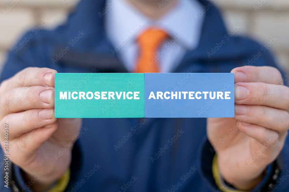 Microservice architecture business concept. Businessman holding ...