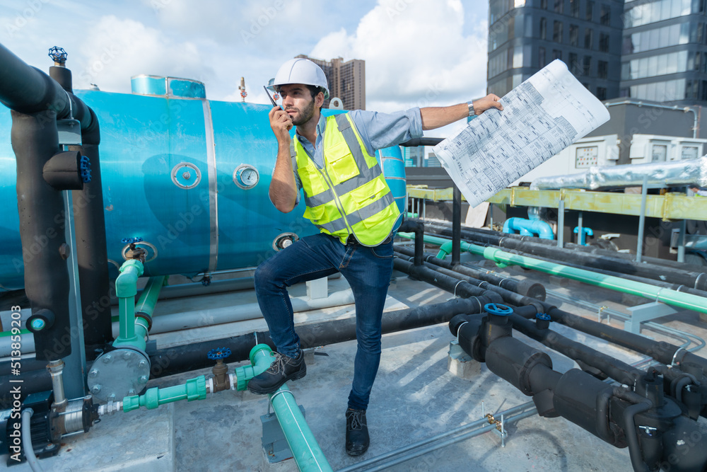 Engineer under checking the industry chilled water fan coil unit air ...