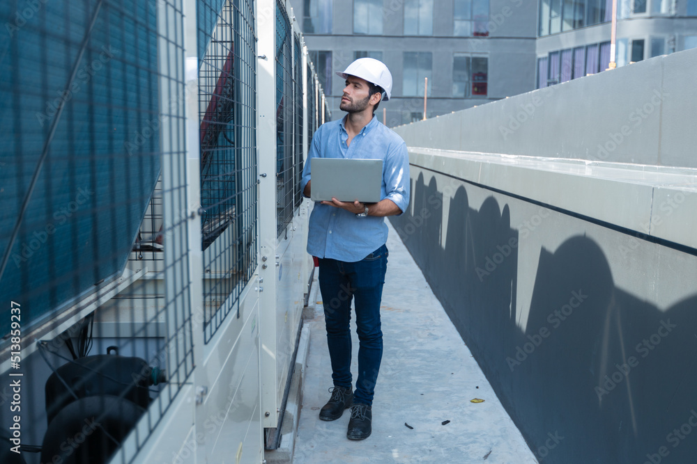Engineer under checking the industry chilled water fan coil unit air ...