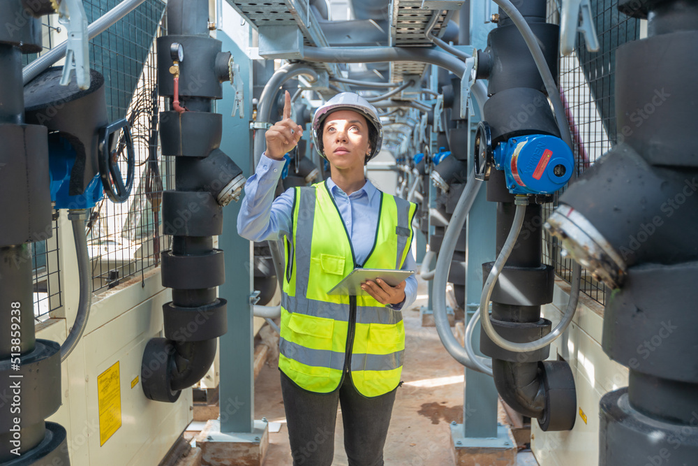 Engineer under checking the industry chilled water fan coil unit air ...