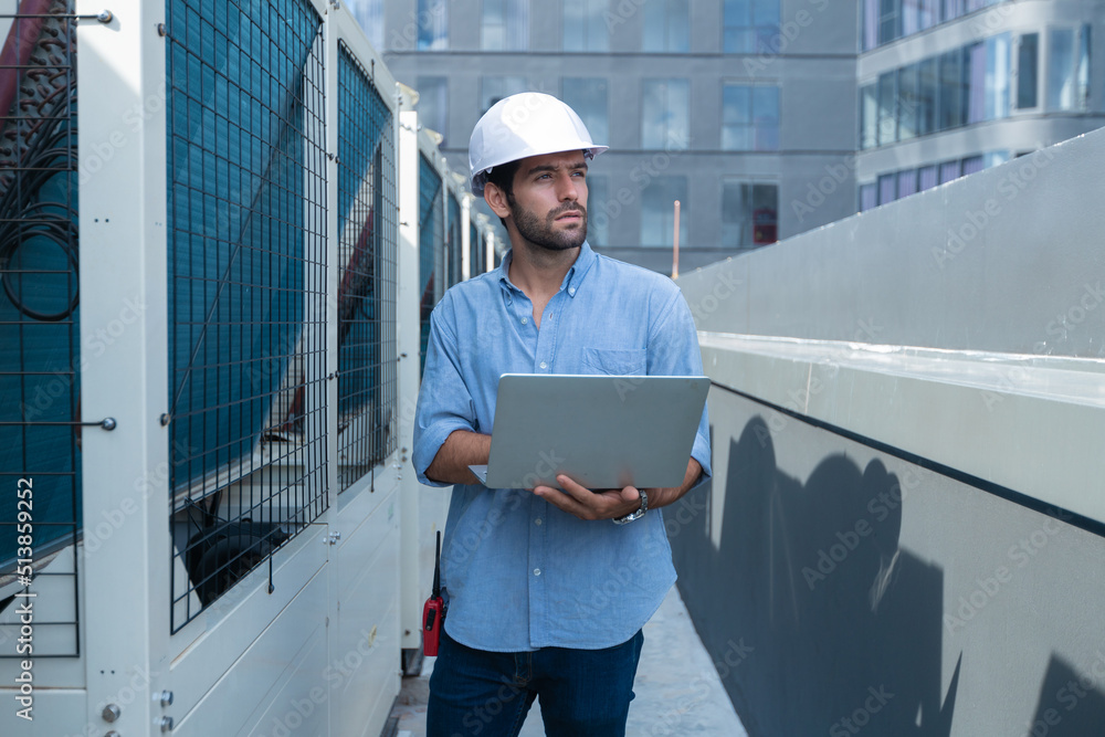 Engineer under checking the industry chilled water fan coil unit air ...