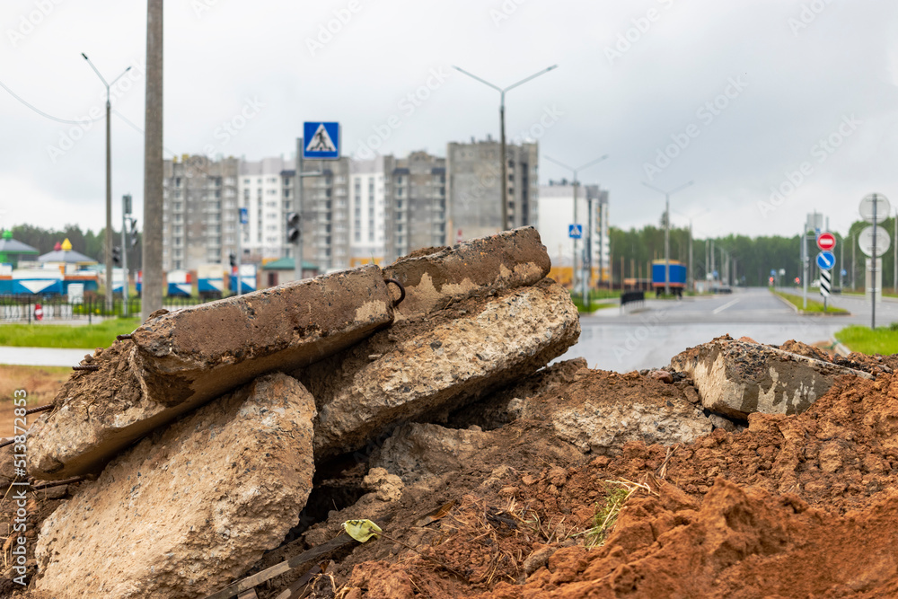 Soil excavation at the construction site. A pile of sand and earth ...