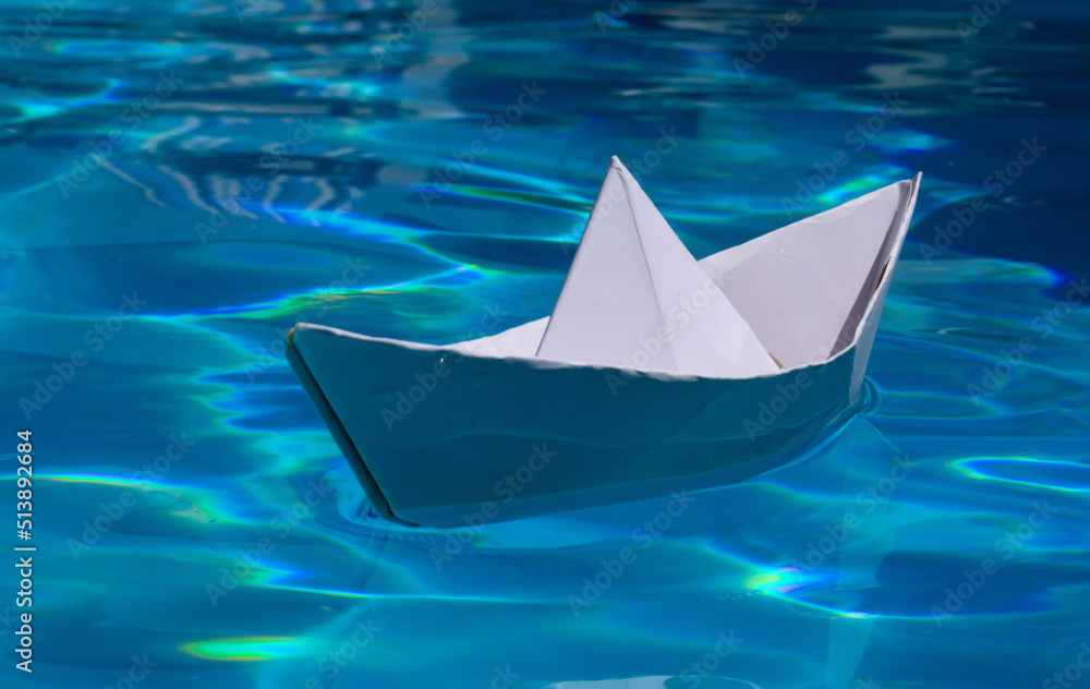 Paper ship. Paper boat in blue sea background. Tourism, travel dreams ...