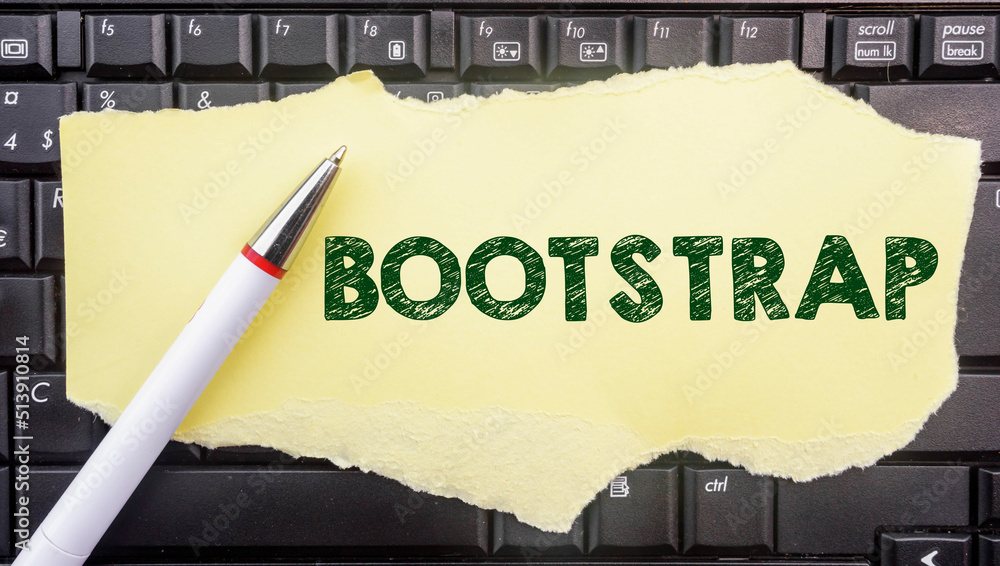 Bootstrap CSS framework . Word Bootstrap on paper and laptop Stock ...