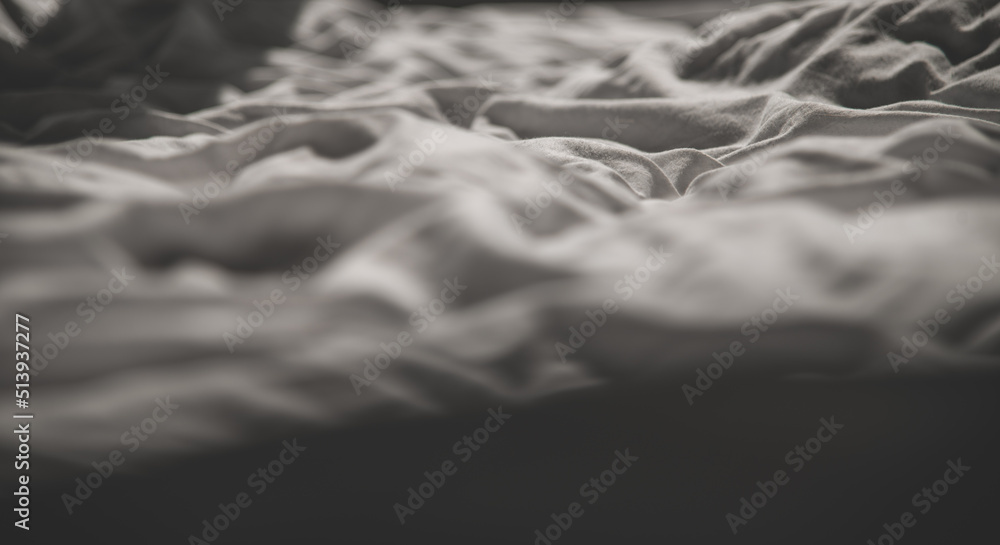 White wrinkled fabic texture rippled surface,Close up unmade bed sheet ...