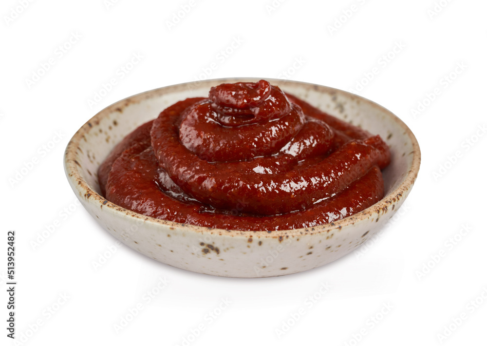 Gochujang or Korean red chili paste in a ceramic bowl isolated on white ...