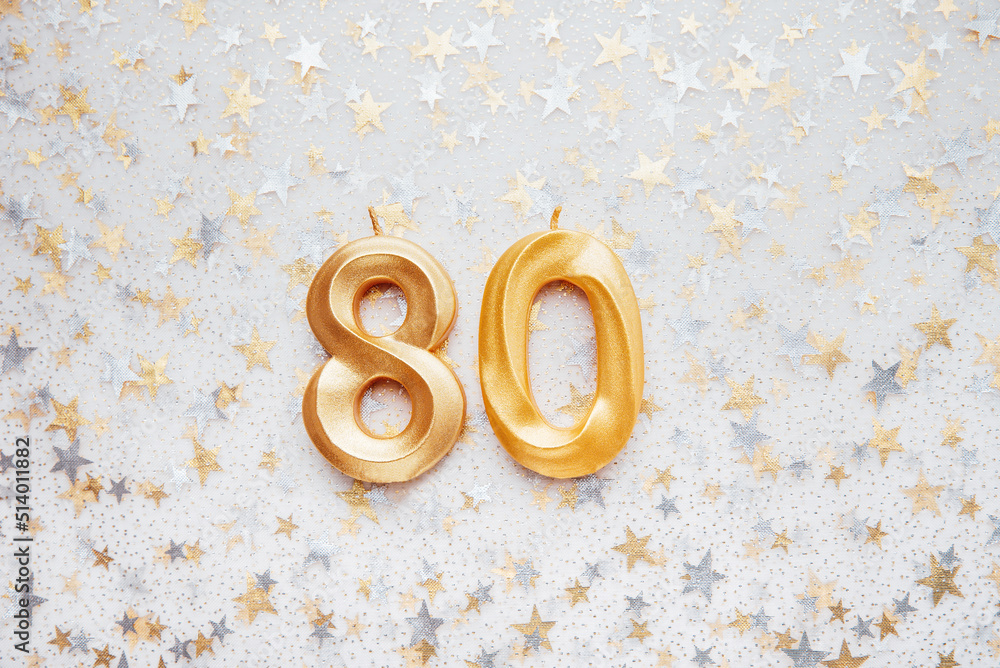 Number 80 eighty golden celebration birthday candle on Festive ...