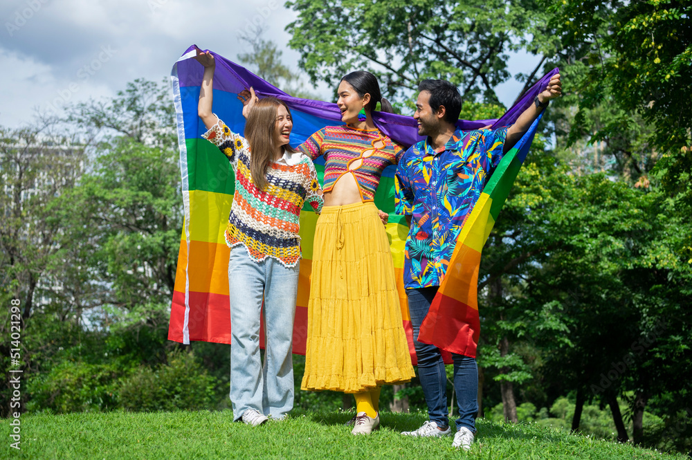 group of lgbtq community movement in rainbow colorful clothes are ...
