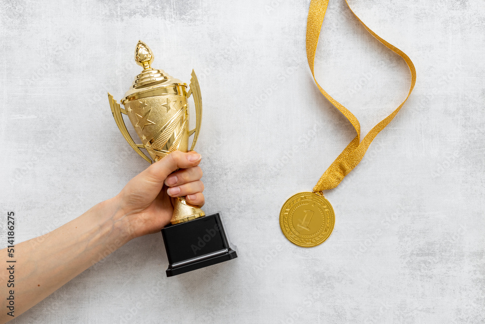 Gold medal first place and award trophy cup. Winner concept Stock Photo ...
