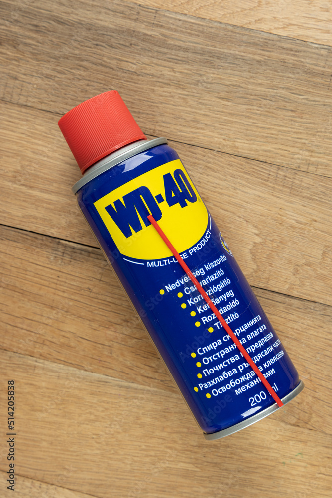 VARNA, BULGARIA - MAY 19, 2022: WD-40 on wooden background. Multi use ...