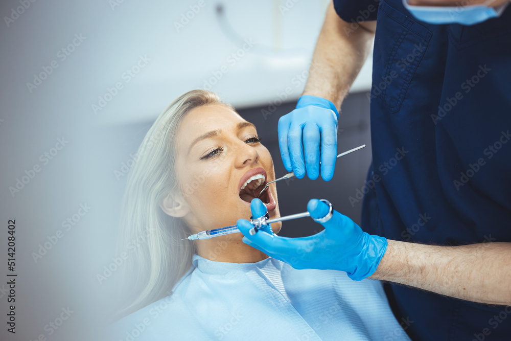 Overview of dental caries prevention.Woman at the dentist's chair ...