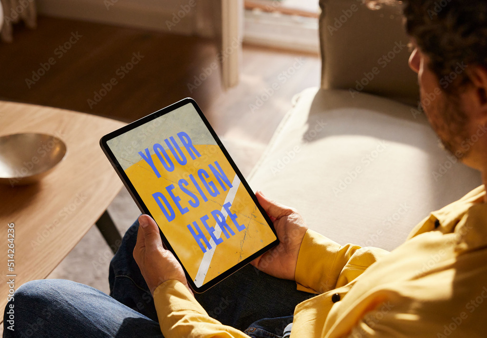 Man Holding a Tablet Mockup Stock Template | Adobe Stock