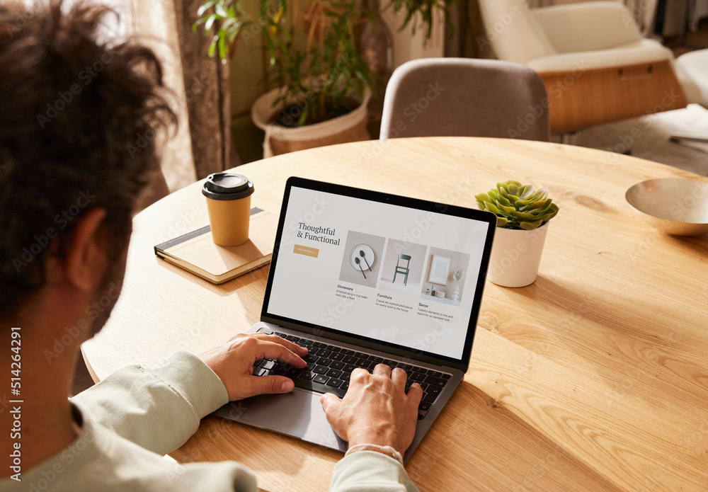 Man Using Laptop with Mockup at Home Stock Template | Adobe Stock
