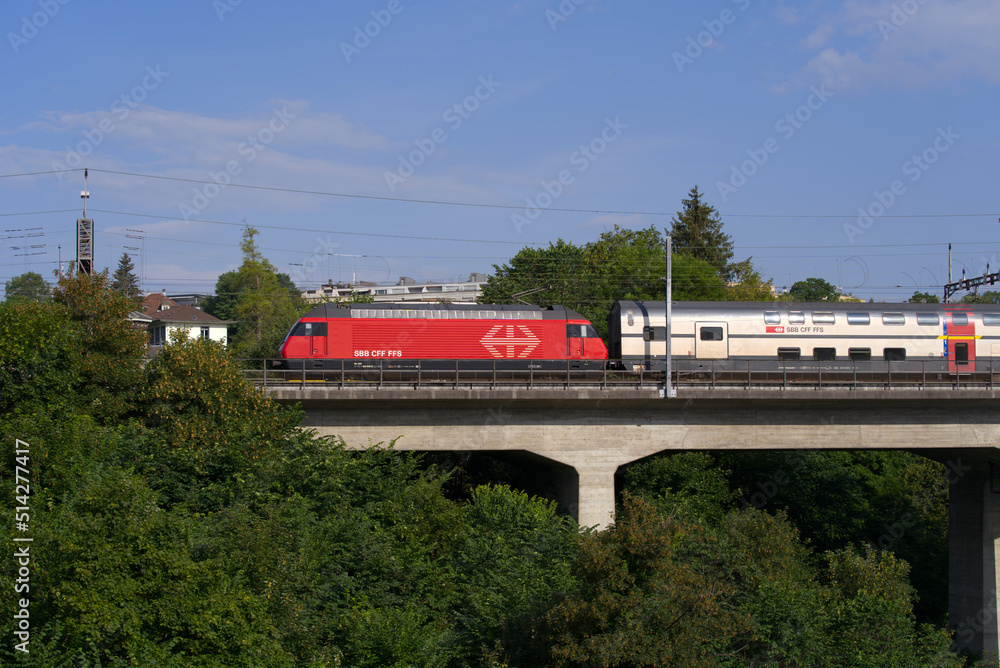 SBB train crossing Lorraine Railway Viaduct over Aare River at City of ...