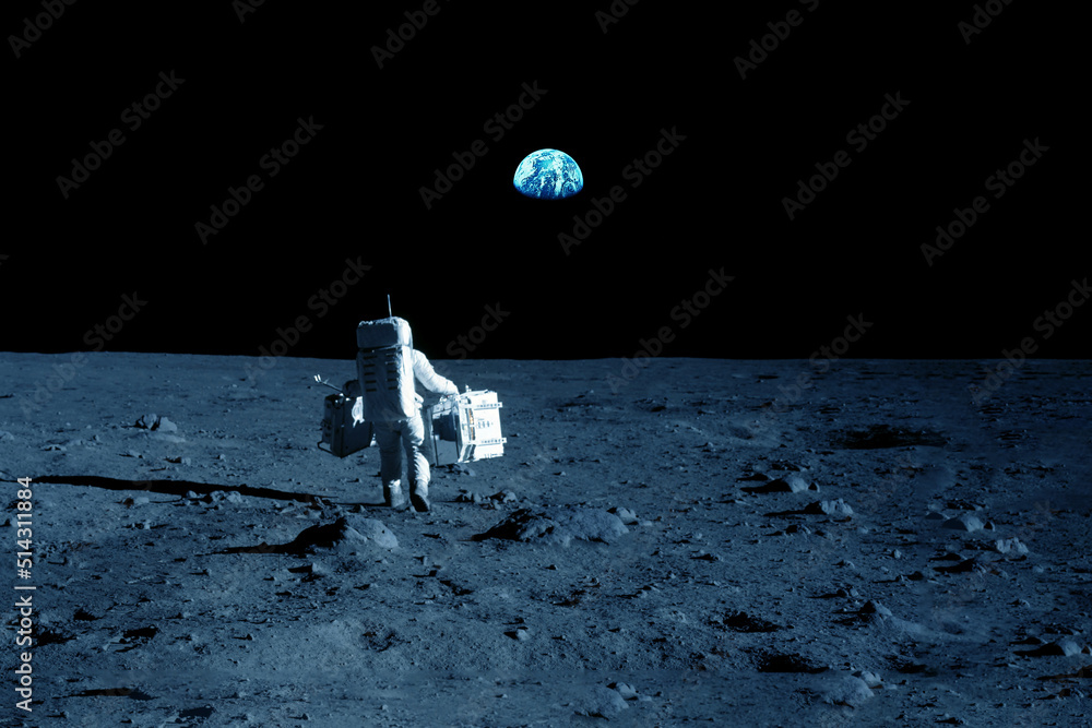 Astronaut on the moon, with the Earth in the background. Elements of ...