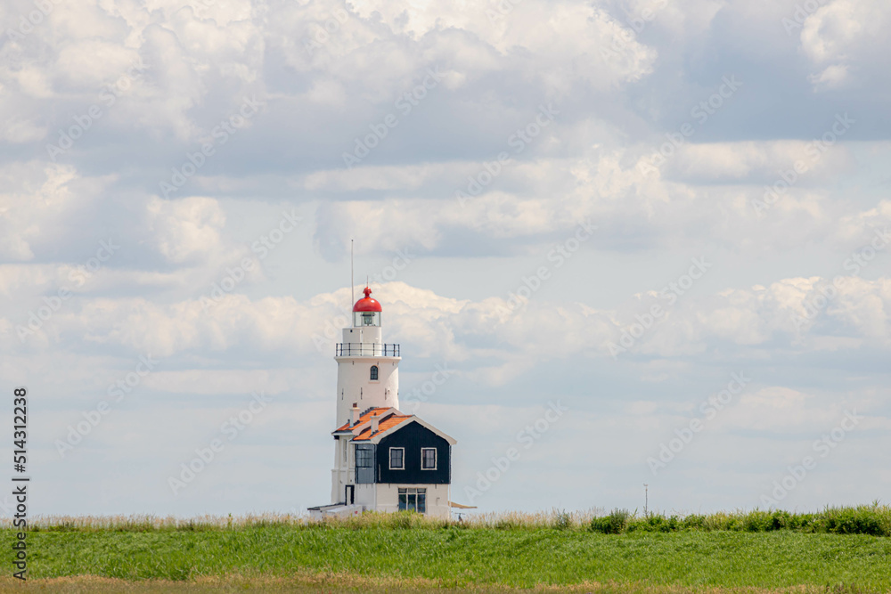 The Horse Of Marken Lighthouse with blue sky and white clouds, Paard ...