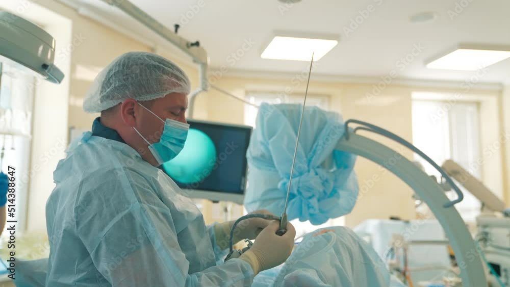 Professional doctor preparing instrument for usage during operation ...