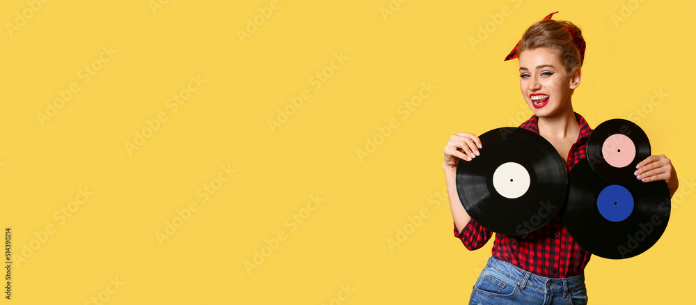 Beautiful pin-up woman with vinyl discs on yellow background with space ...