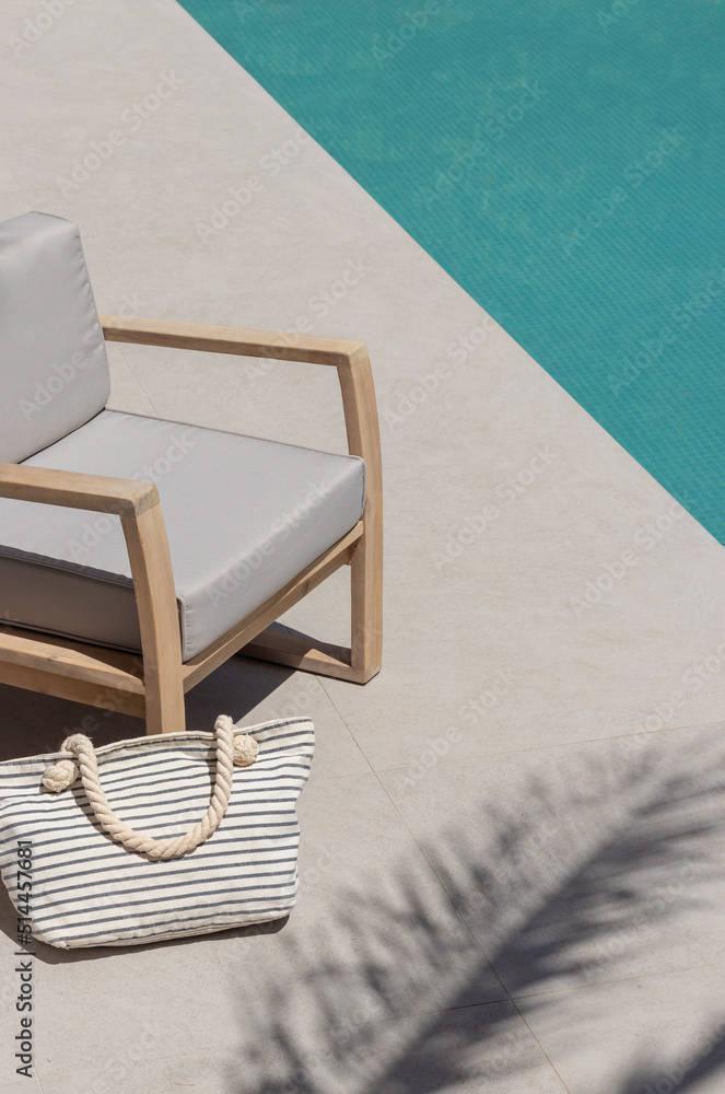 Swimming pool top angle view background of seating area and striped ...