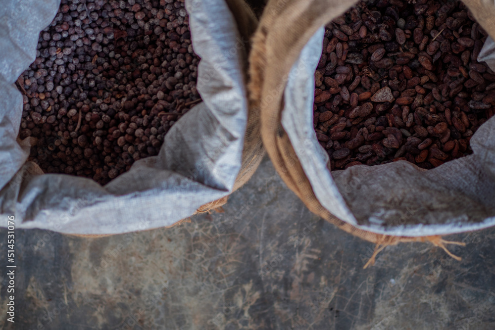 Cocoa beans in textured bags, top view. The cocoa is ready for loading ...