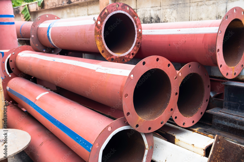 Rust-proof painted steel pipes in the factory. Rust-proof paint, water ...
