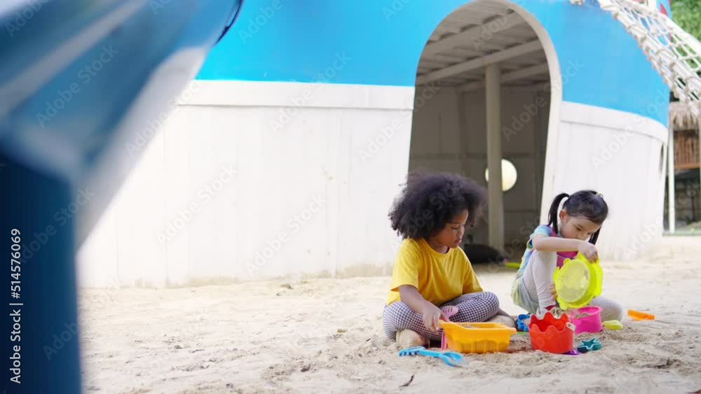 Vidéo Stock Group of Diversity children kid playing sand with toy ...
