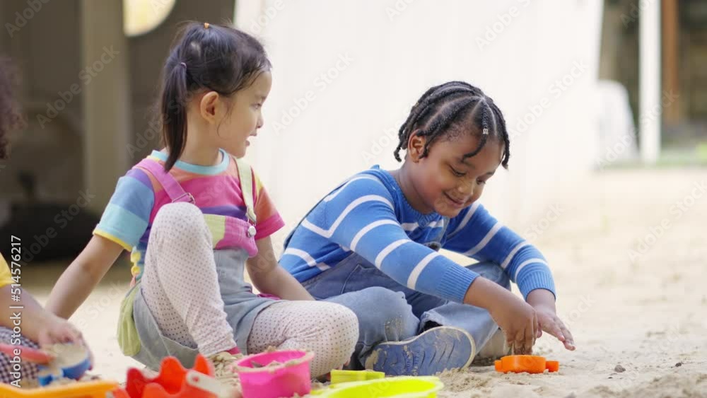 Group of Diversity children kid playing sand with toy together at ...