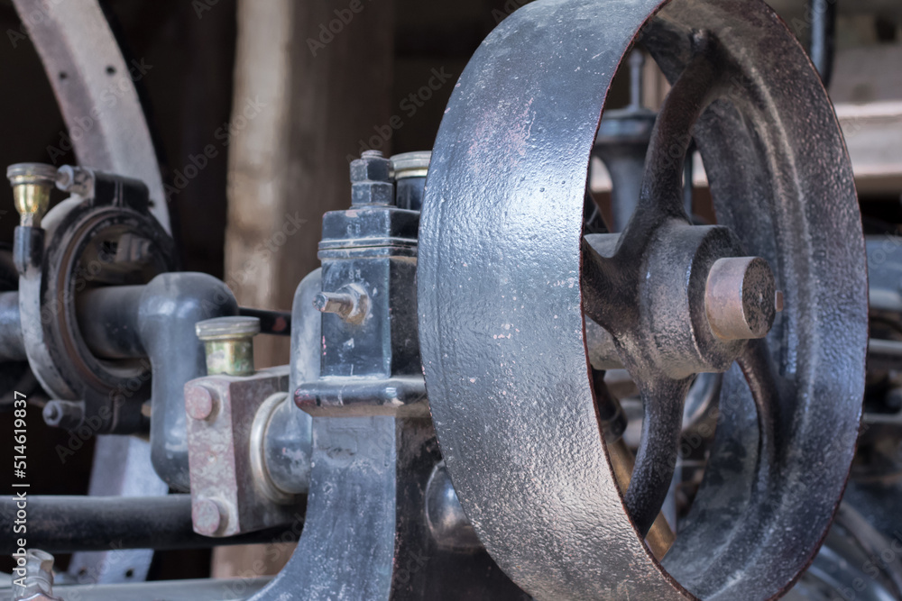 Parts of a steam engine in close-up shows the technology and aesthetics ...