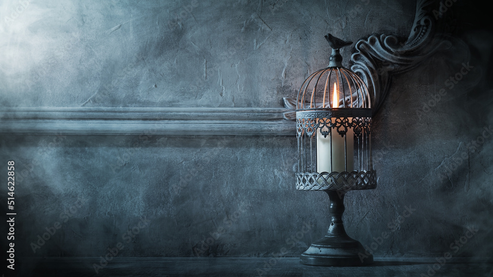 Mystical Halloween still-life background. Candlestick with candles, old ...
