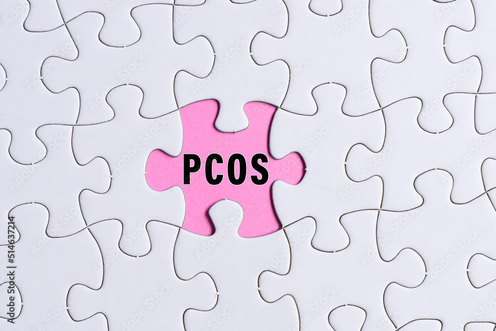 PCOS text on white jigsaw puzzle over pink background. Health Care ...
