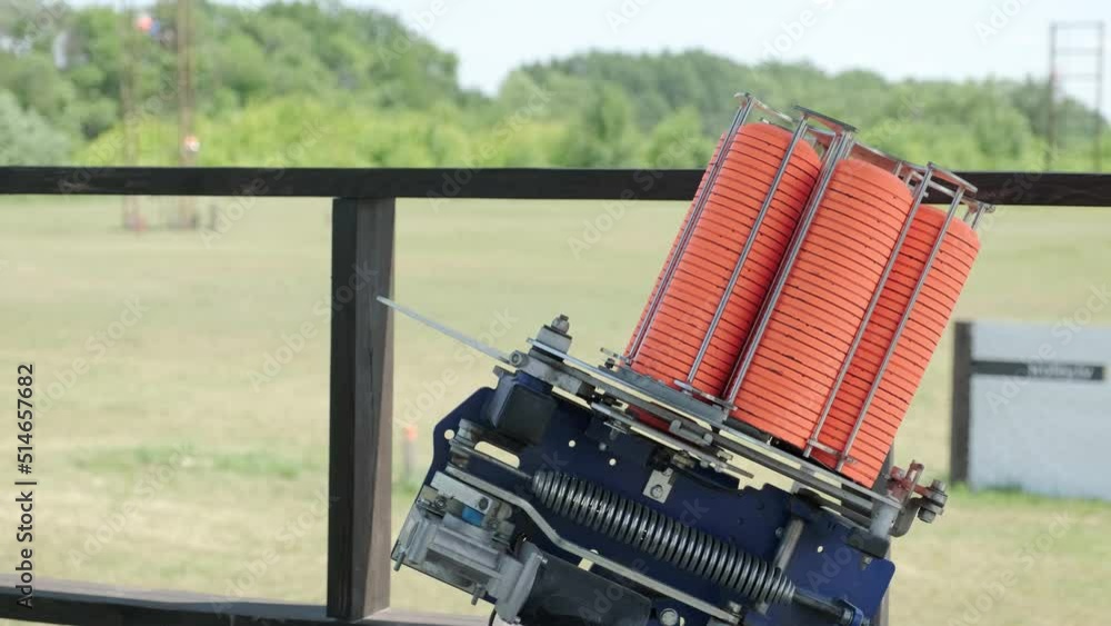 Sportsman shoots from a double-barreled shotgun, A sports field for a ...