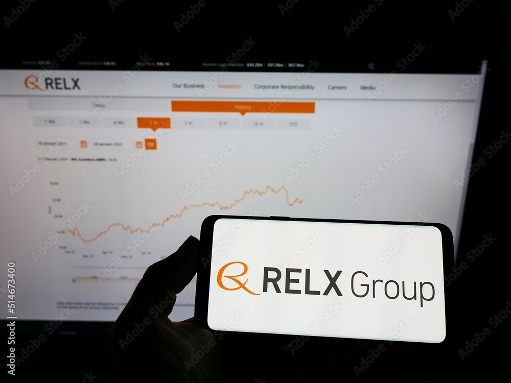 Stuttgart, Germany - 01-30-2022: Person holding mobile phone with logo ...