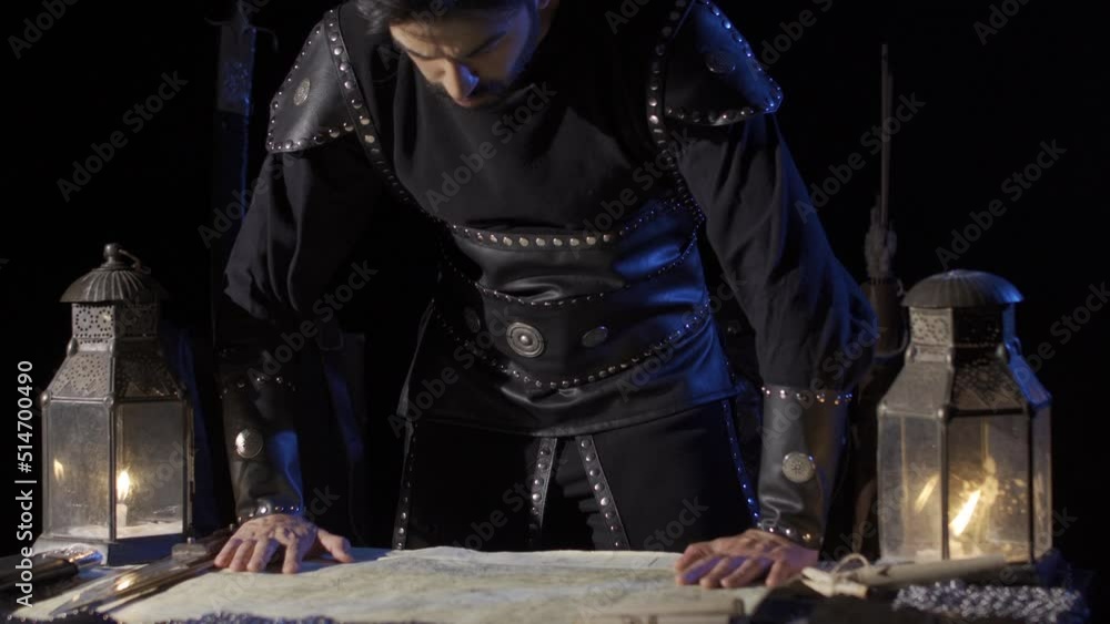 The commander who puts his hands on the table and makes a mark on the ...