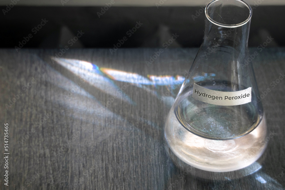 Hydrogen Peroxide in a glass flask - top view. The concept of the ...