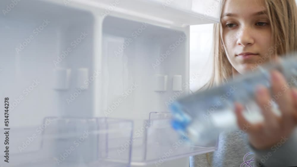 Child Opening Fridge, Kid Put a Bottle of Water in Refrigerator, Girl ...