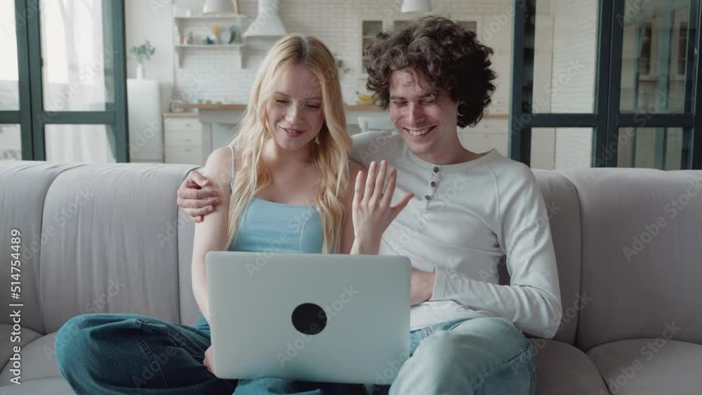 Young Couple making Video-Call at new modern Loft Interieur. Young ...