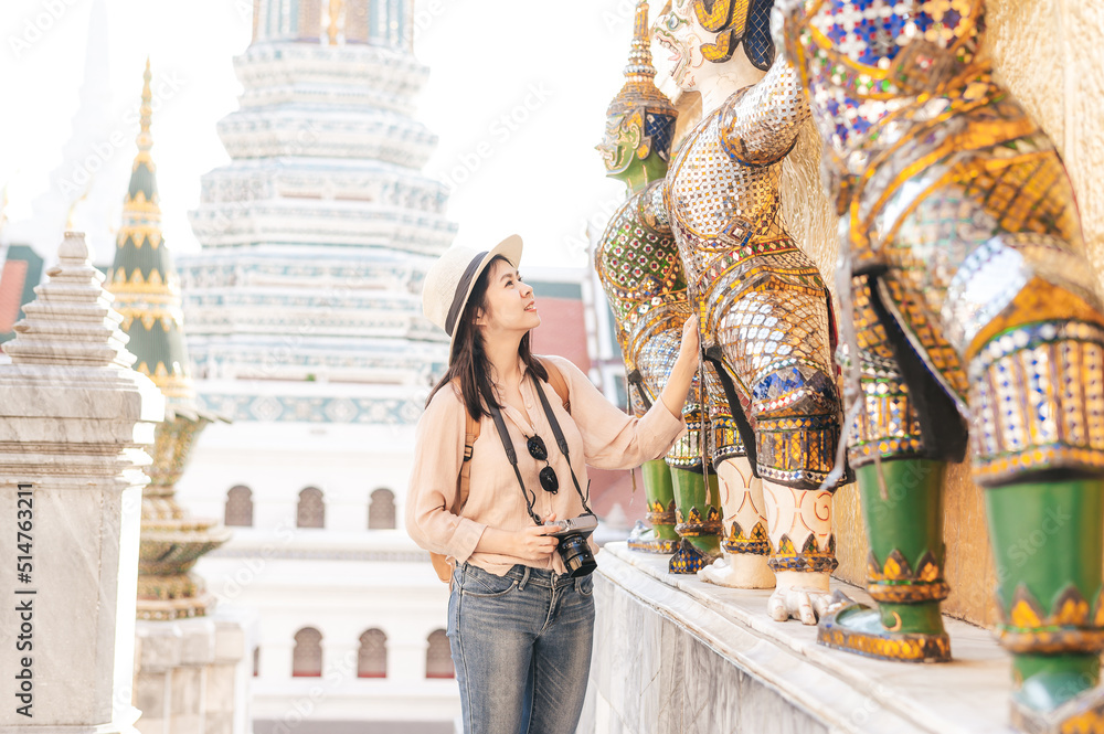 Tourist Asian woman enjoy sightseeing while travel in temple of the ...